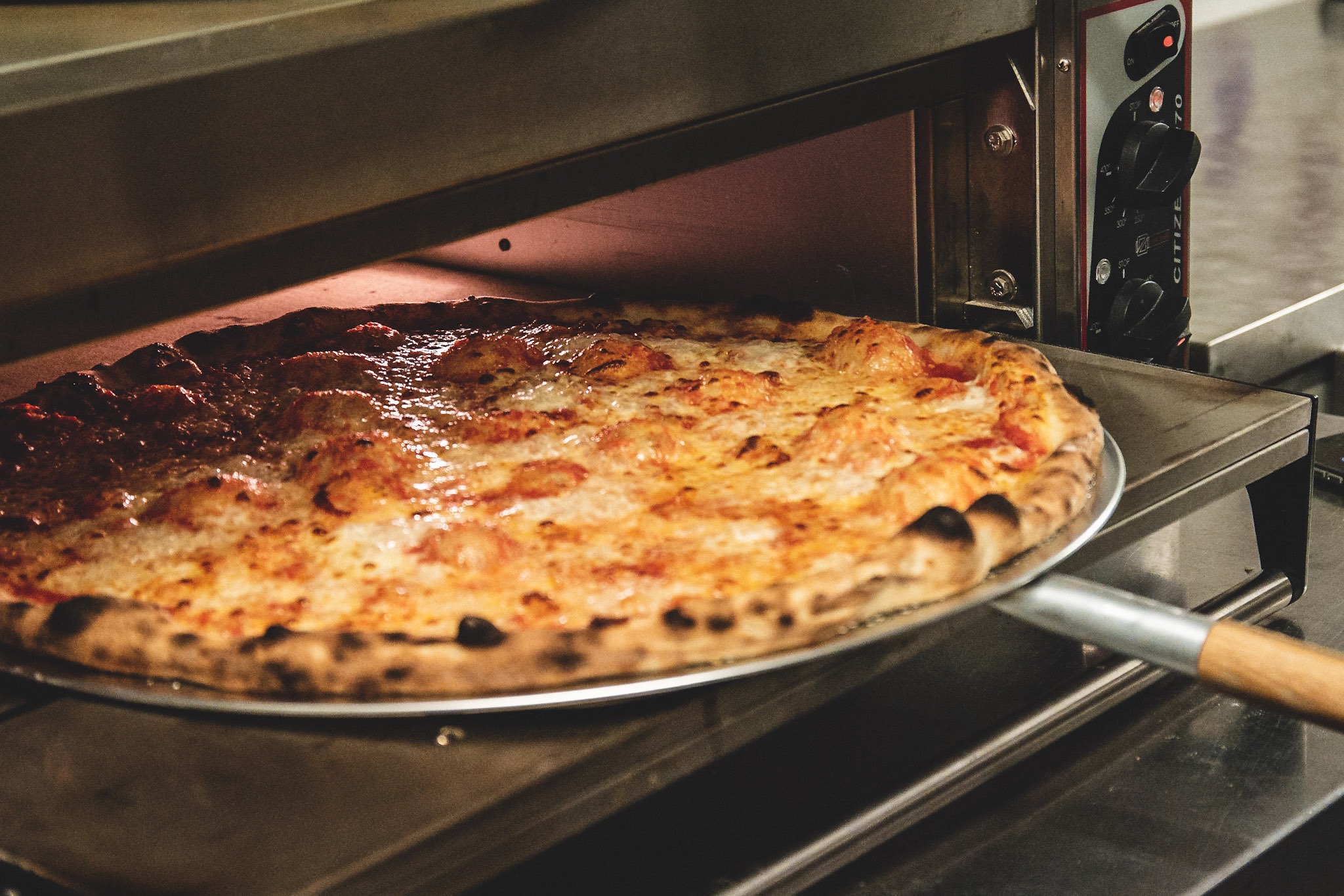 Nell's Pizza is BACK in the NQ with their giant NYC style pizza slices